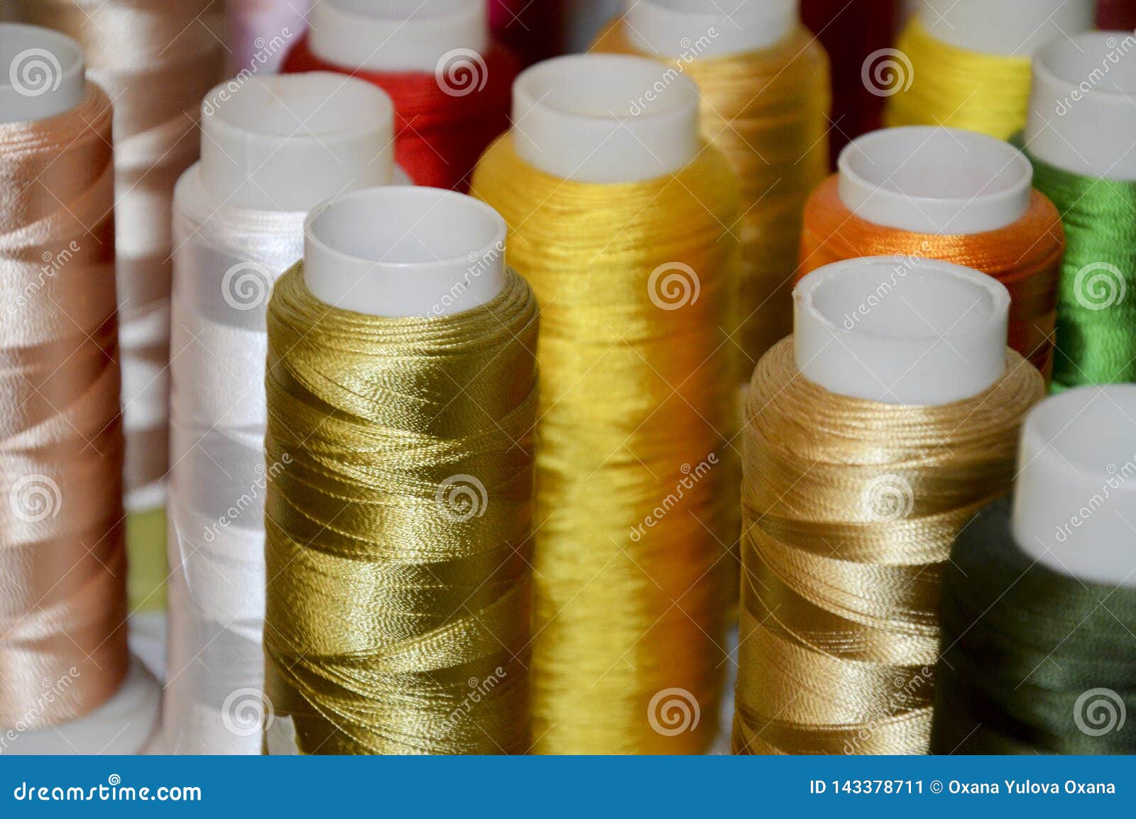 Reels of colored threads stock image. Image of threads - 143378711
