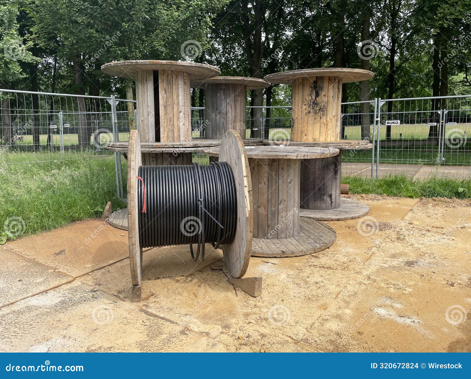 Reels Connected with Wires Next To a Wire Spool Editorial Stock Image ...