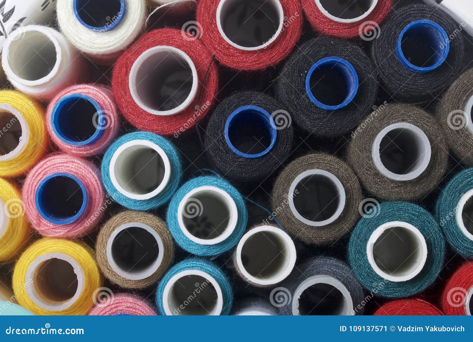 The Reels of Threads of Different Colors are Folded in a Box. Threads ...