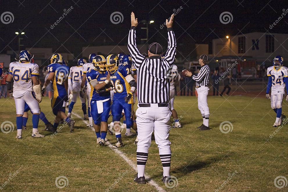 Referee calling touchdown editorial photography. Image of night - 26128167