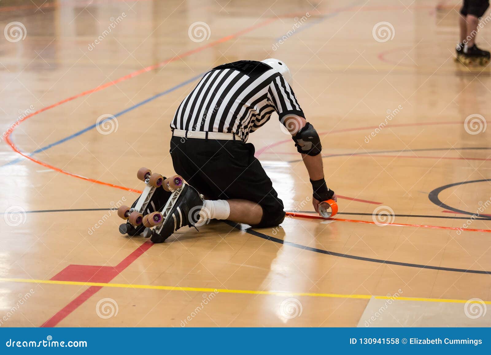 Referee Fixing the Tape on a Roller Derby Floor Editorial Stock Photo ...