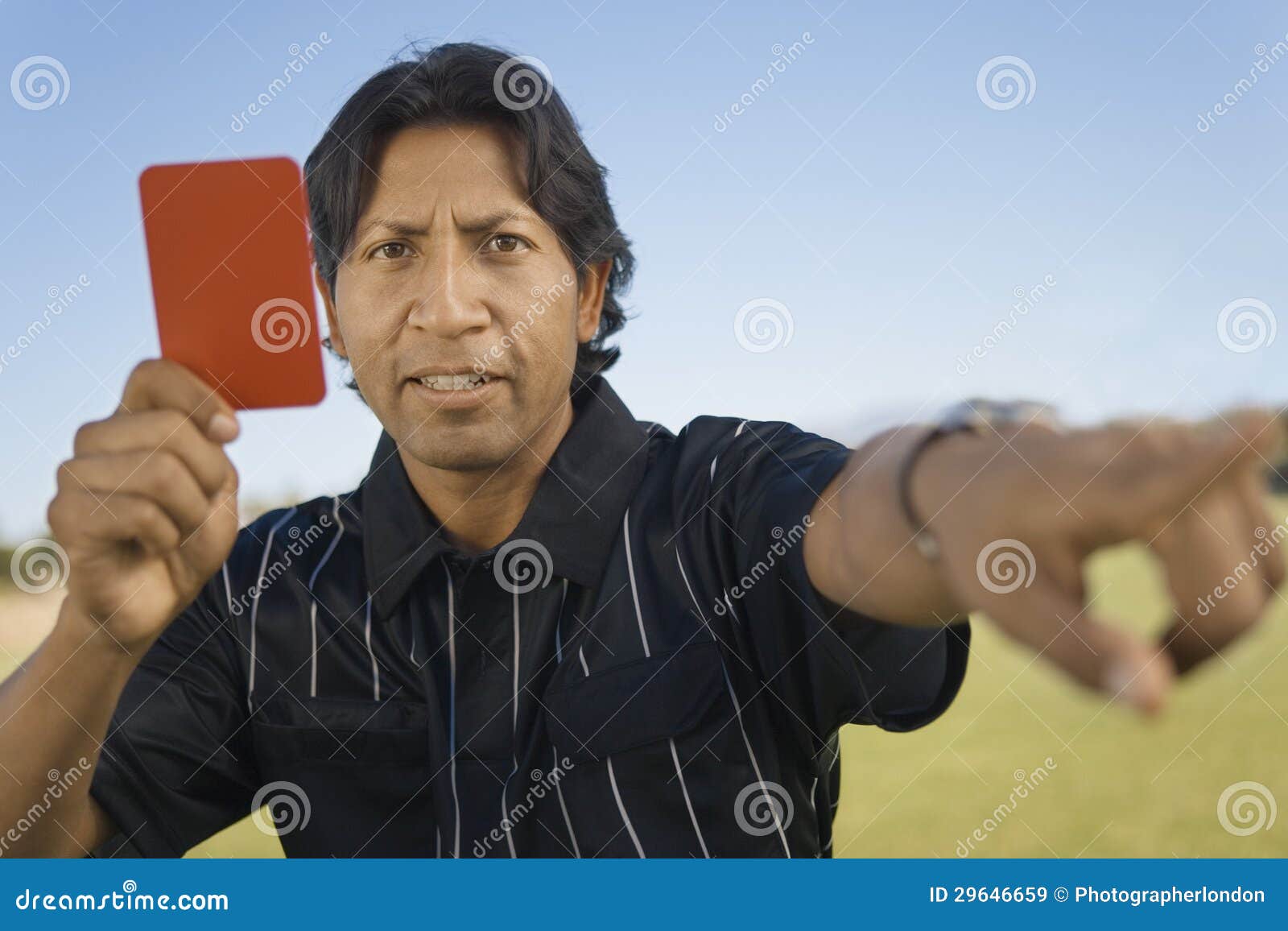 Referee Holding Red Card stock image. Image of outdoors - 29646659