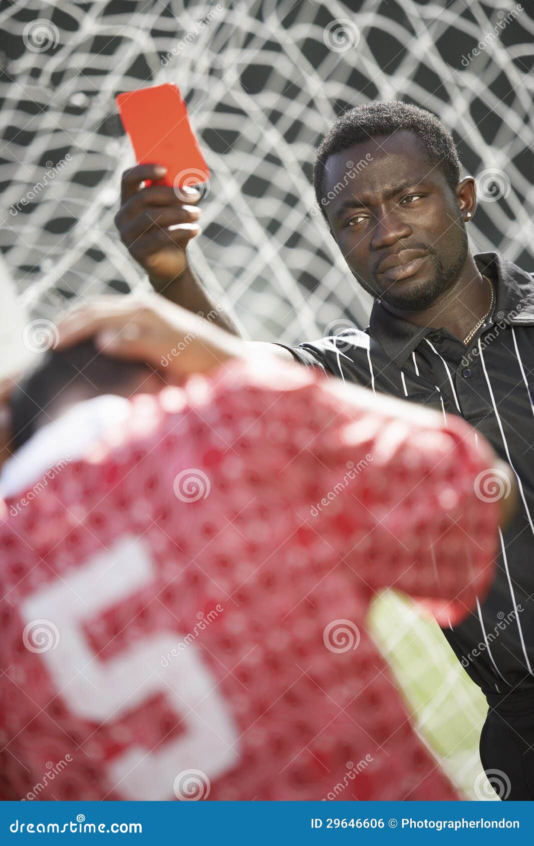 Referee Showing Red Card Indicating Dismissal Stock Photo - Image of ...