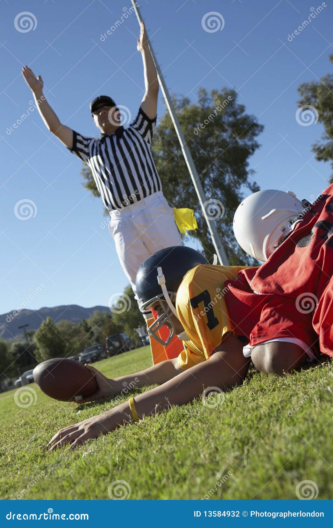 Referee Signalling Touchdown Over Football Player Stock Photo - Image ...