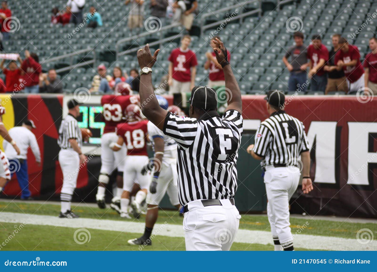 The Referee Signals for a Touchdown Editorial Image - Image of ...