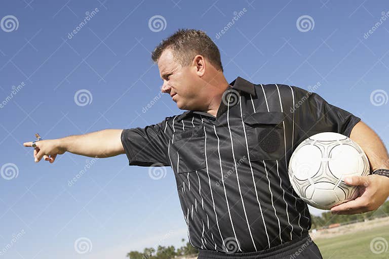 Referee with Soccer Ball Pointing Stock Image - Image of pointing ...
