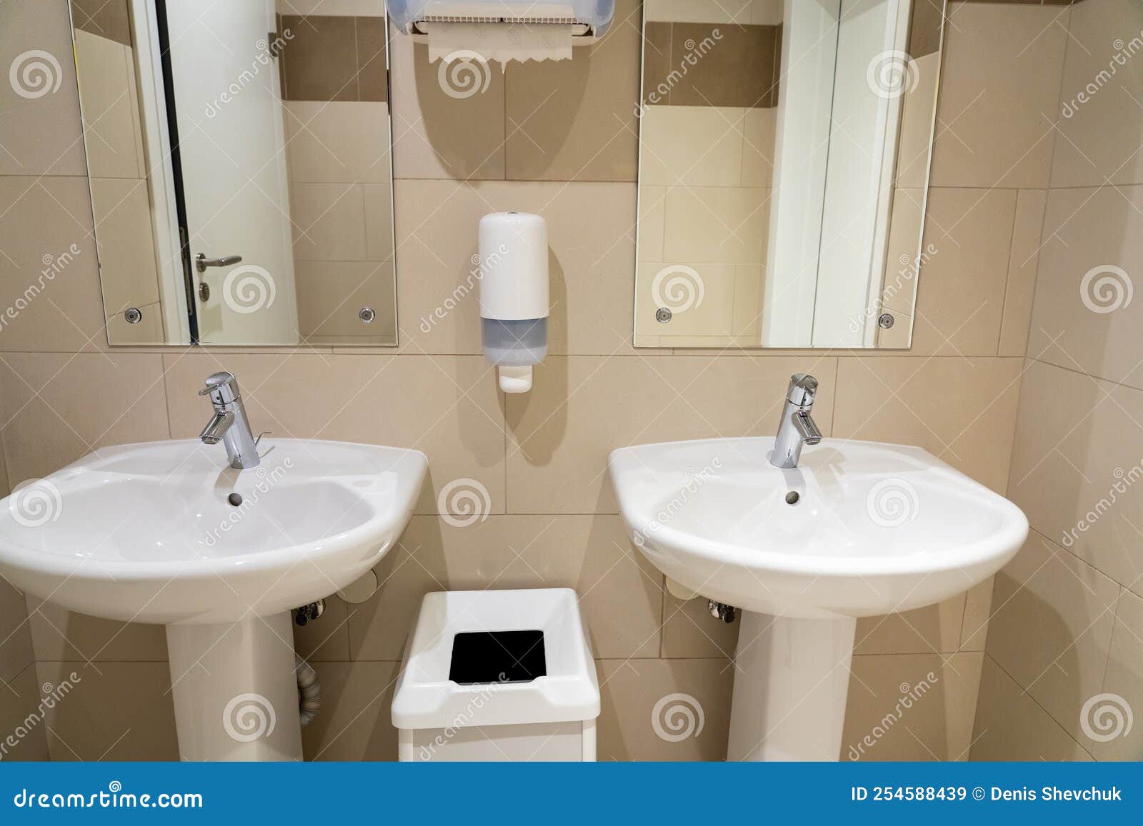 Reference Photo of Ceramic Sinks in a Public Restroom with Soap Dish ...