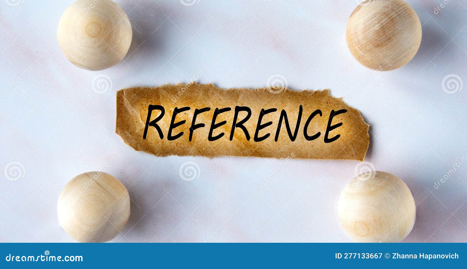 REFERENCE - Word on a Brown Torn Piece of Paper on a Light Background ...