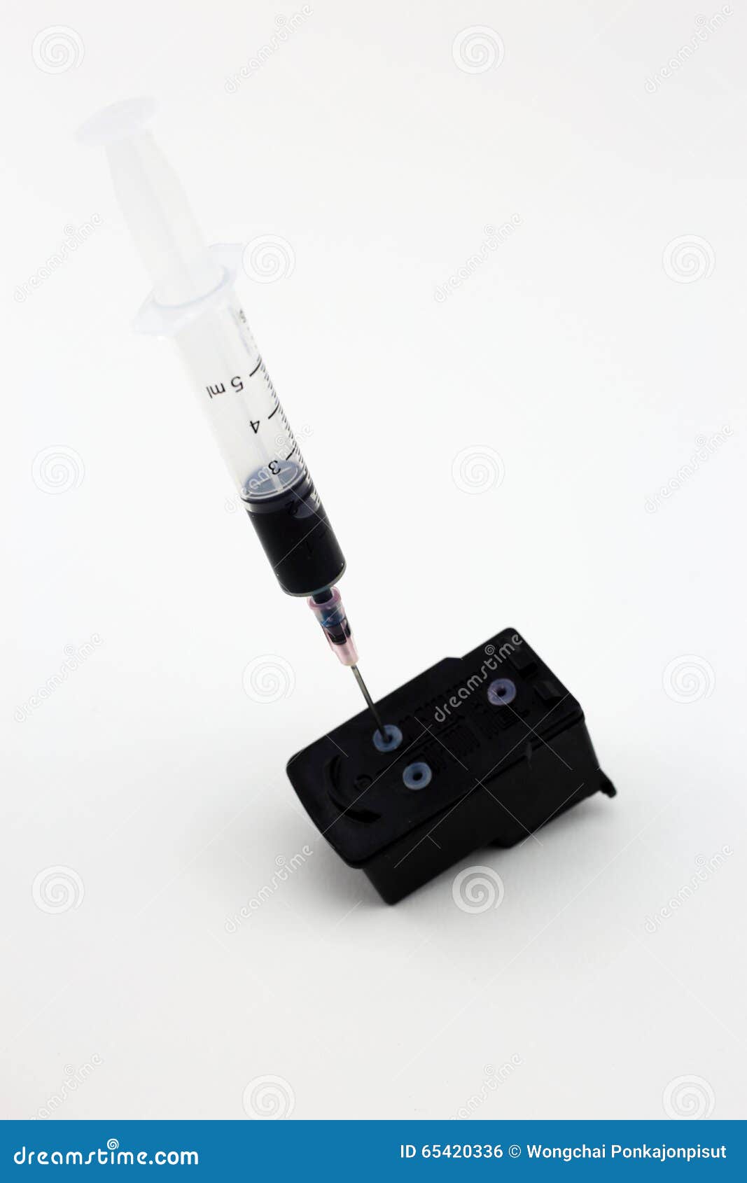 Refilling ink cartridges stock photo. Image of plastic - 65420336