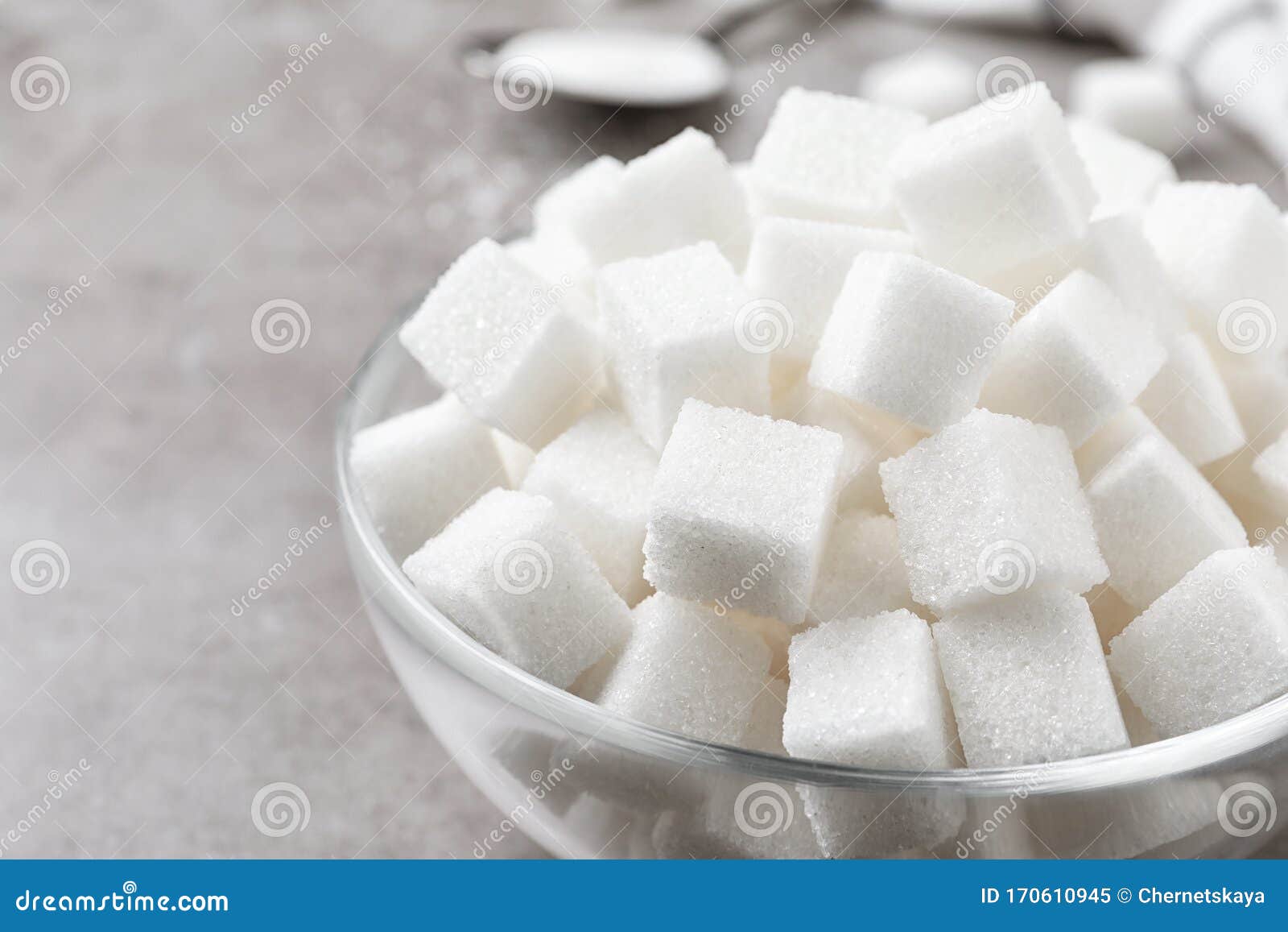 Refined Sugar Cubes in Glass Bowl on Grey Table, Closeup Stock Image ... Refined Sugar Cubes in Glass Bowl on Grey Table, Closeup Stock Image ...