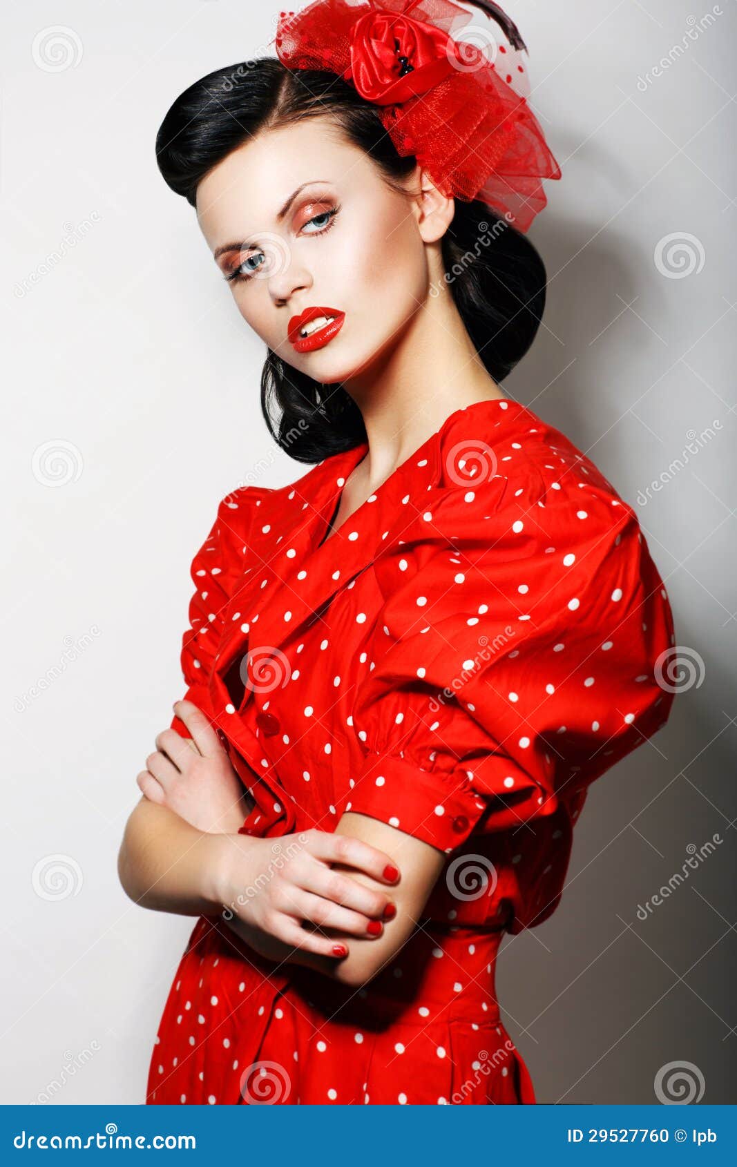 Refinement Sophisticated Arrogant Woman In Red Polka Dot Dress With