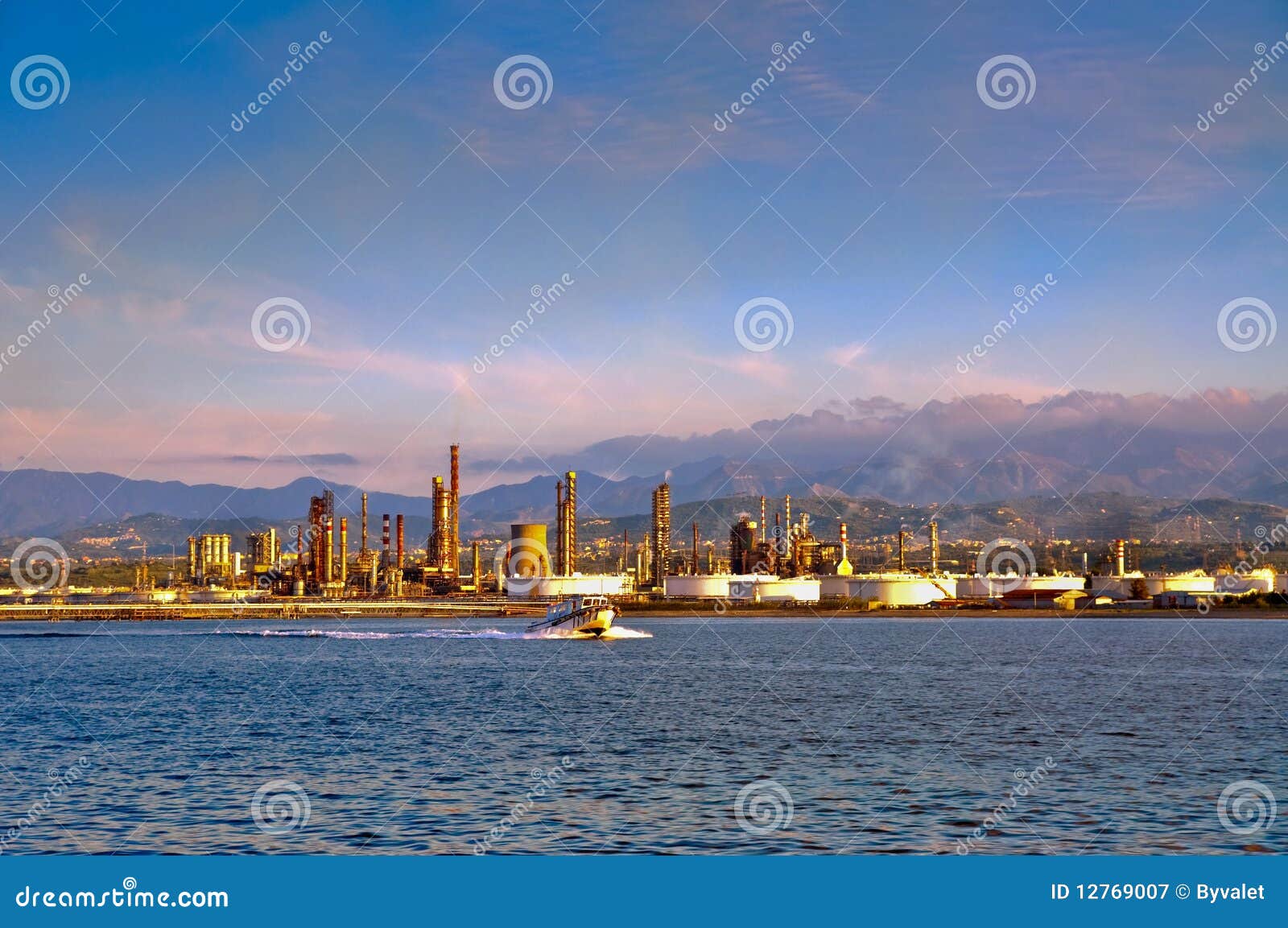 Refinery area at sunset stock image. Image of refinery - 12769007