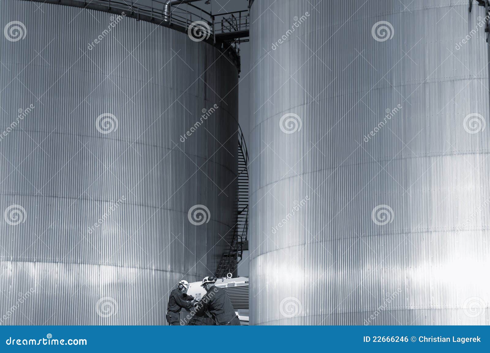 Refinery Fuel- Towers and Engineers Stock Photo - Image of engineers ...