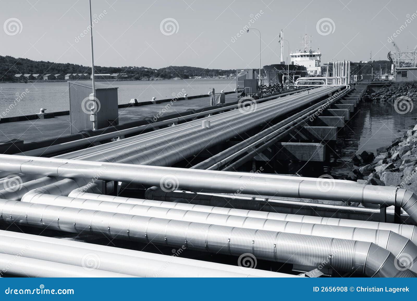 Refinery Pipelines and Ship Stock Photo - Image of tanker, distillery ...