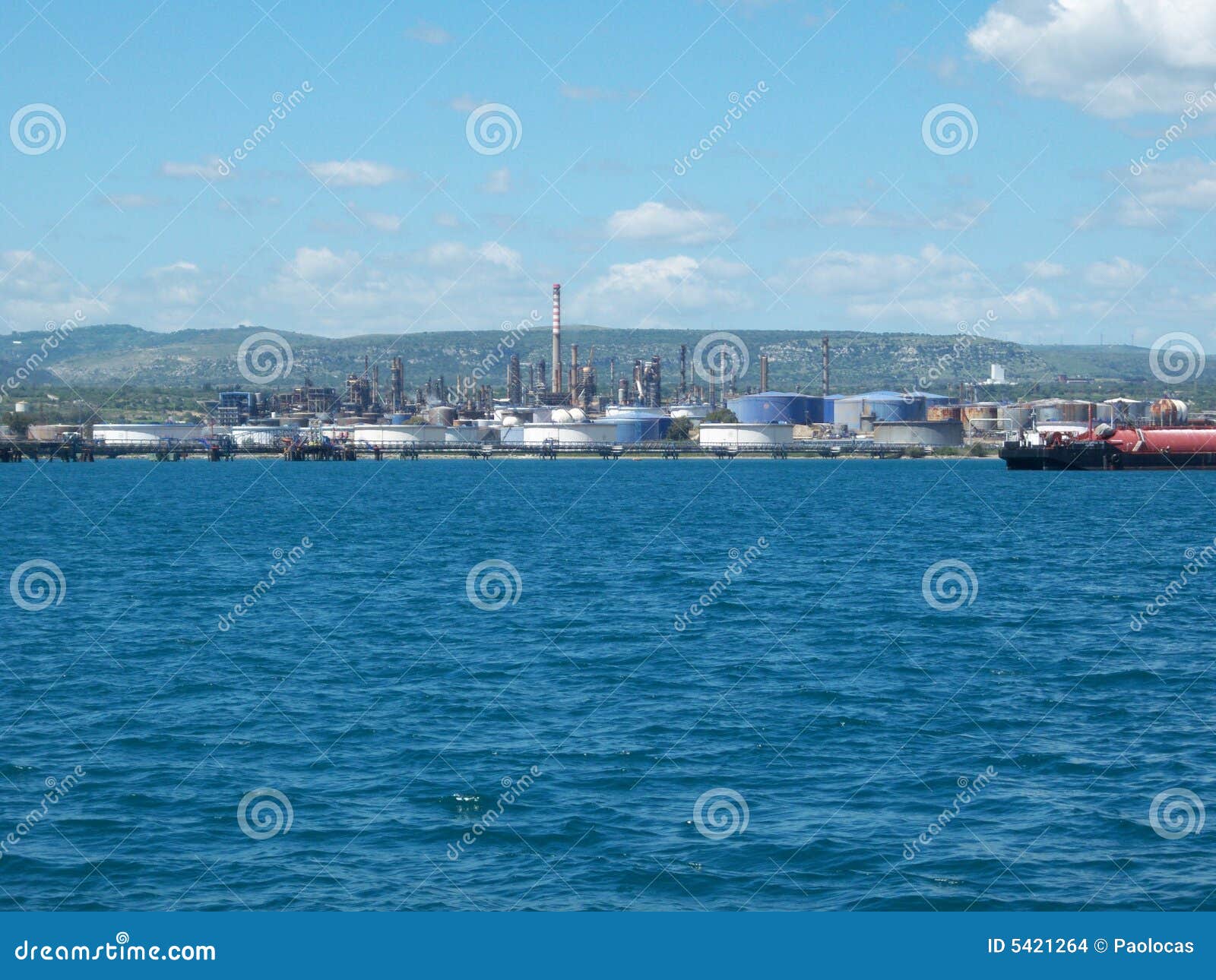 Refinery and storage tanks stock photo. Image of environment - 5421264