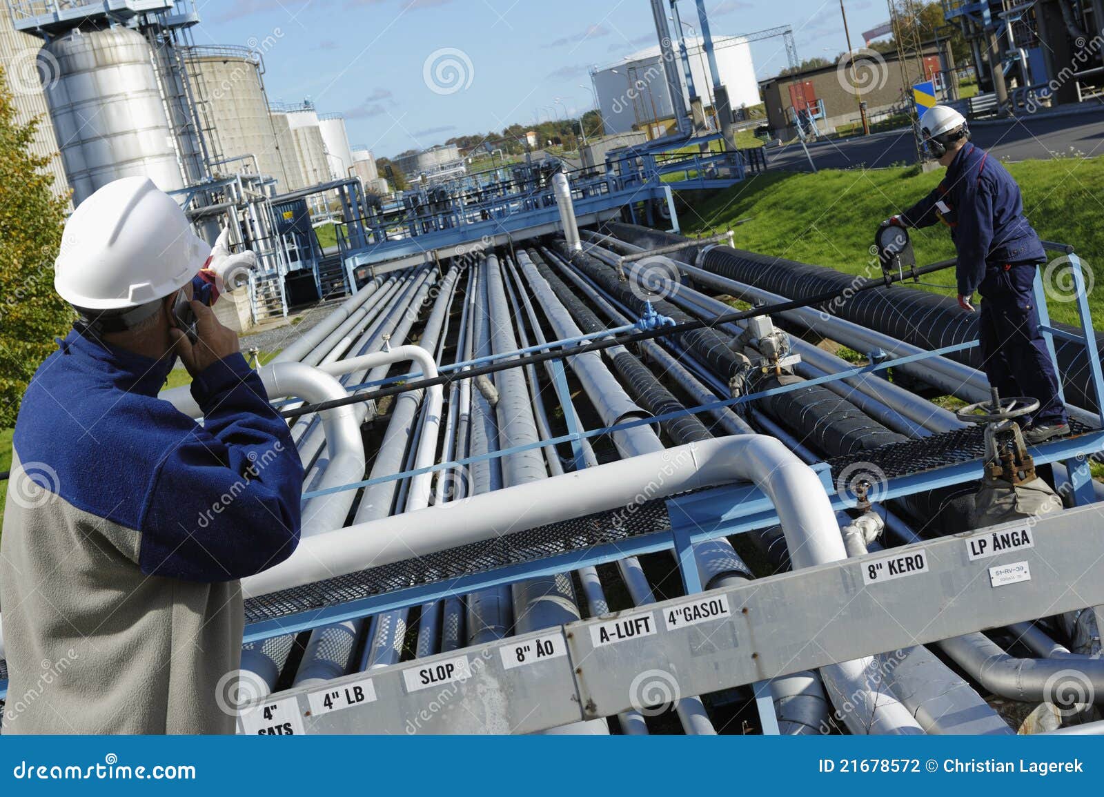 Refinery workers and fuel stock photo. Image of industrial - 21678572