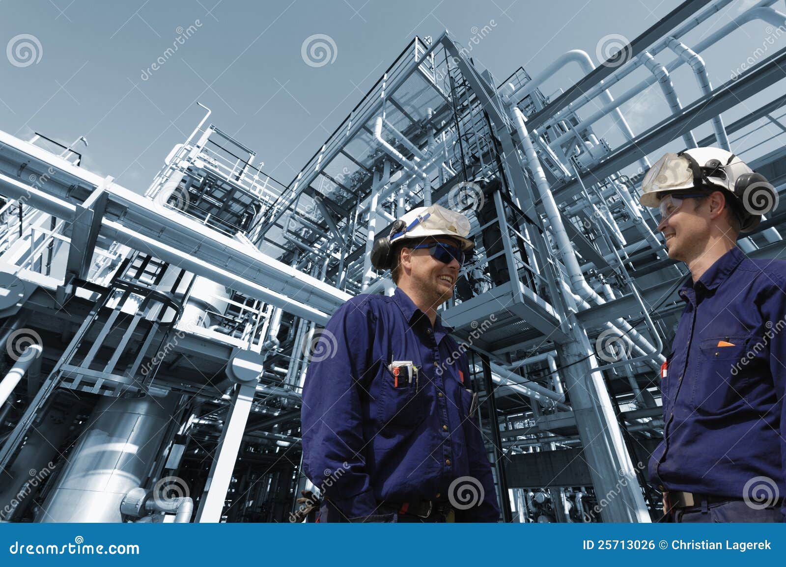 Refinery Workers and Pipelines Stock Photo - Image of industry ...