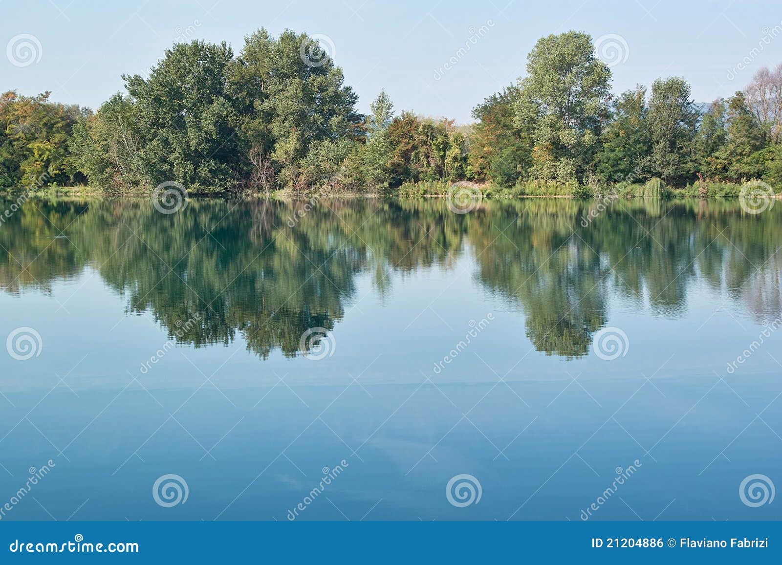 Reflected in a Mirror of Water Stock Photo - Image of shore, water ...