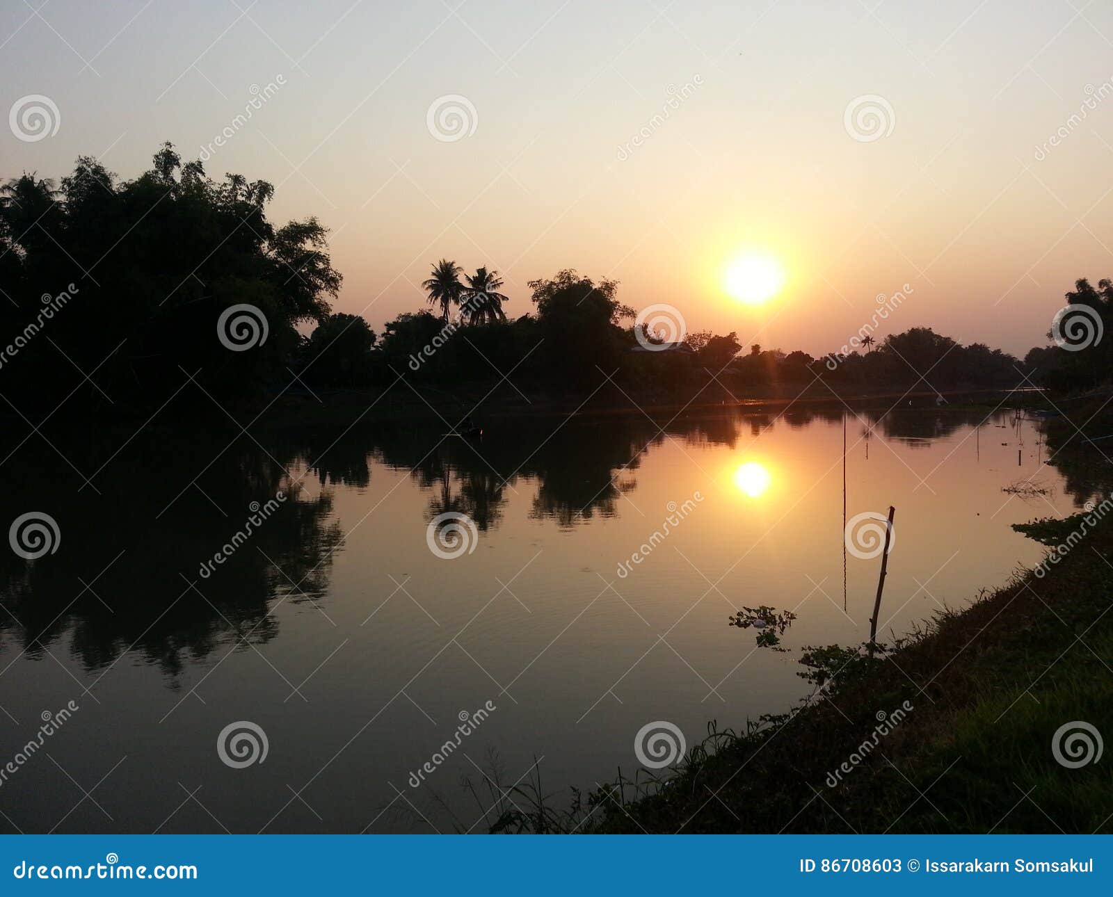 The Reflection on the Banks of the Tha Chin River Stock Image - Image ...