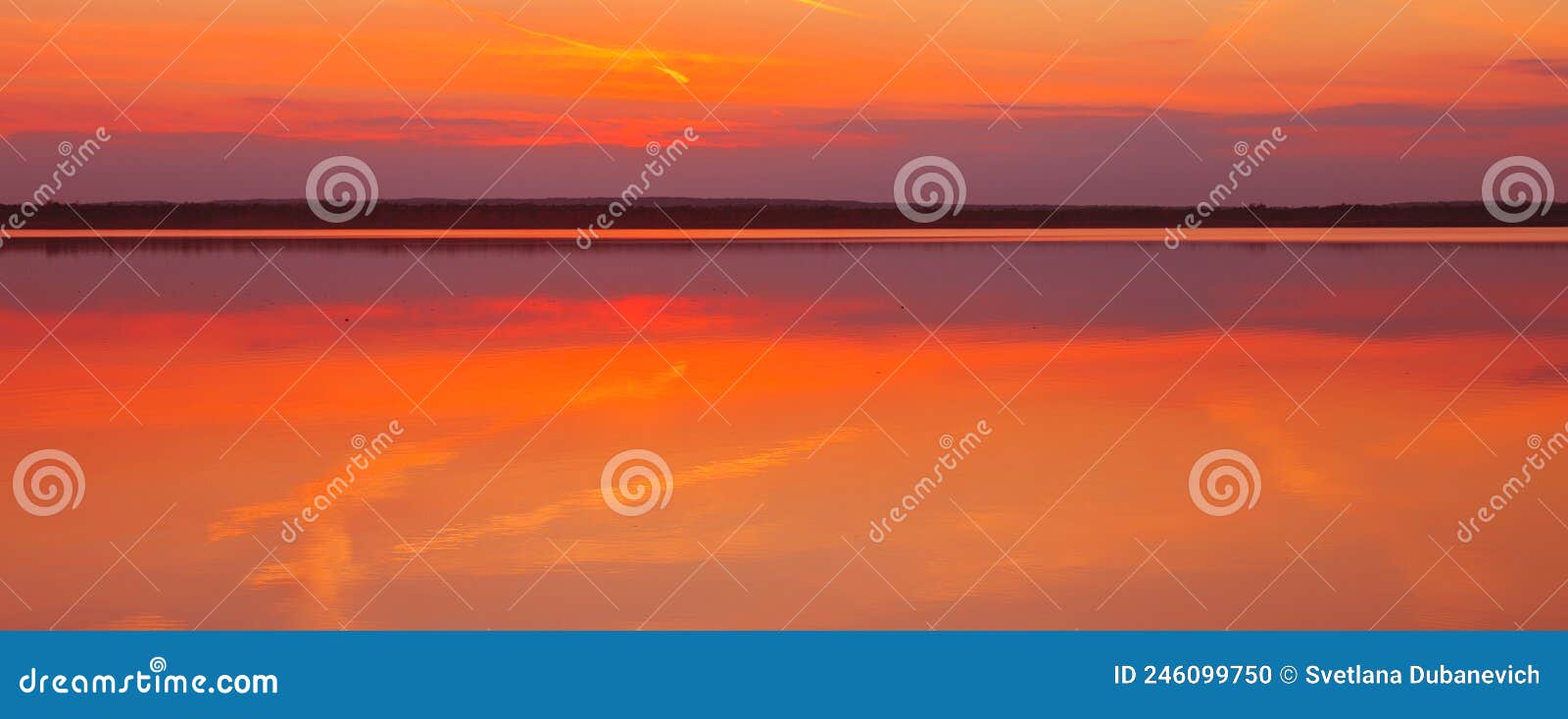 Reflection of a Beautiful Sunset Over the Water Stock Photo - Image of ...