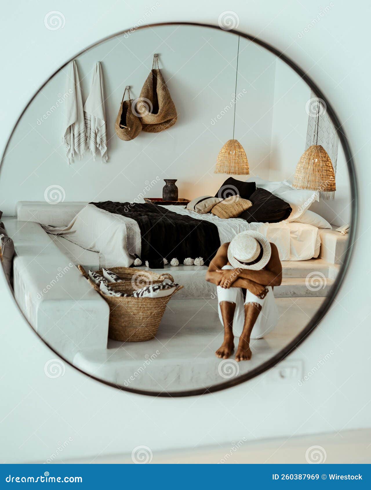 Reflection of a Black Man Sitting in a Room with Boho Environment in ...