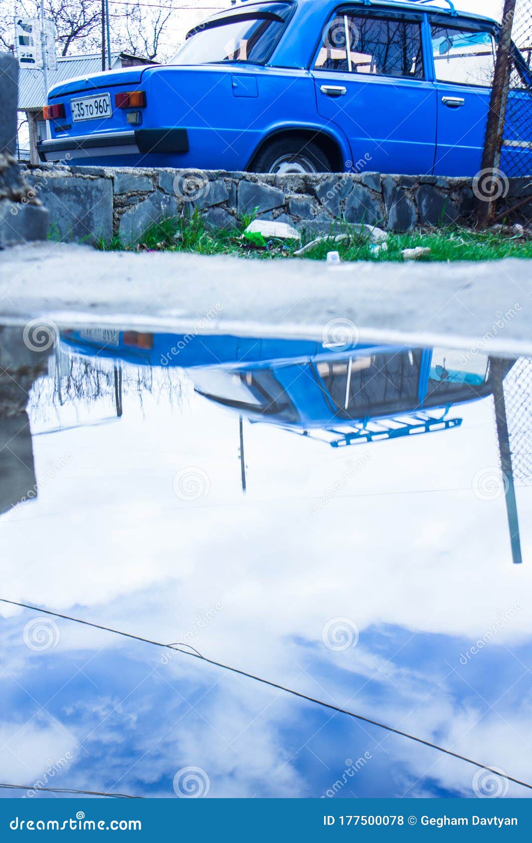 The Reflection of a Blue Car on the Water Editorial Stock Photo - Image ...