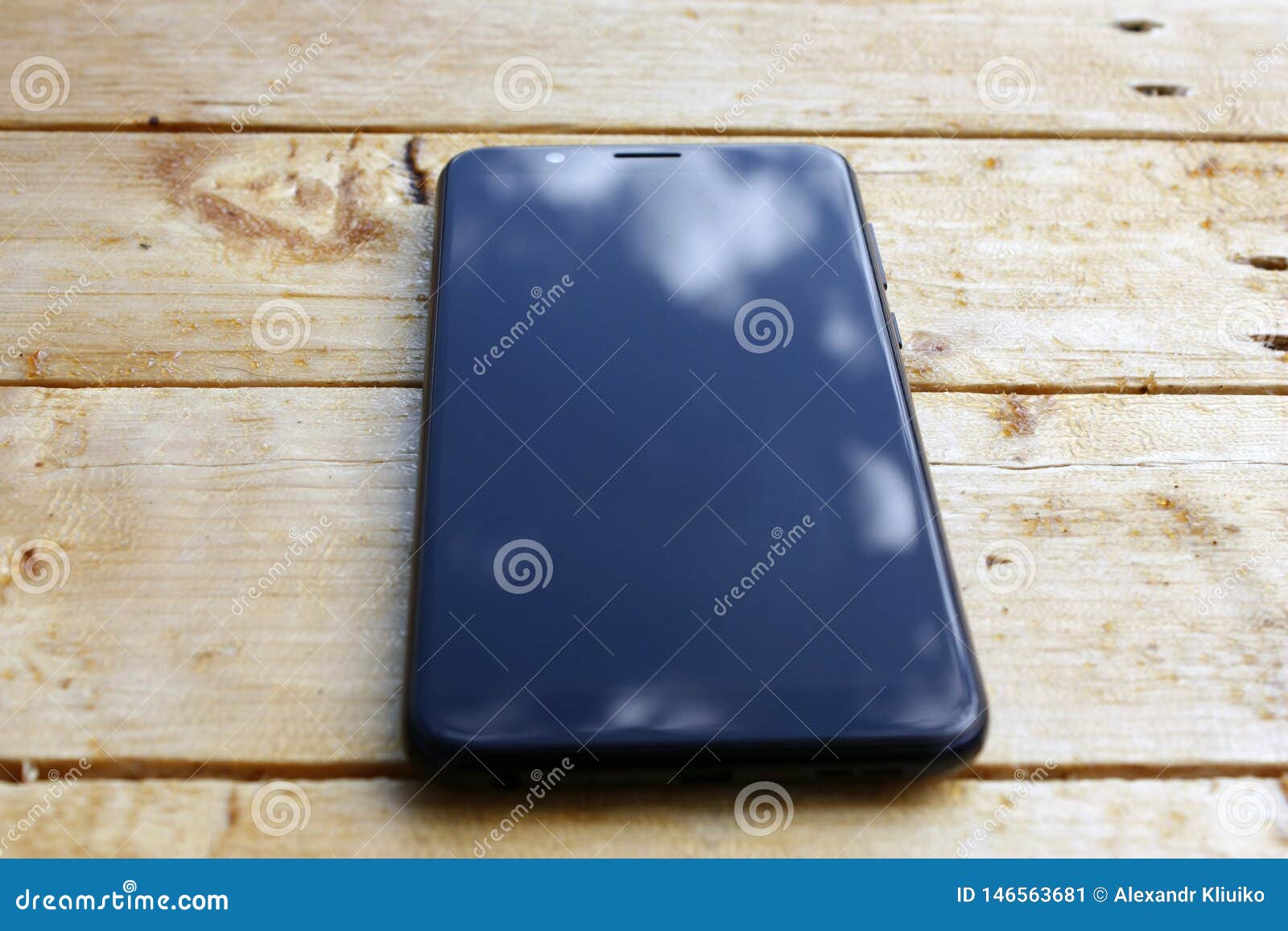 Reflection of Blue Sky with White Clouds on the Smartphone Screen on a ...