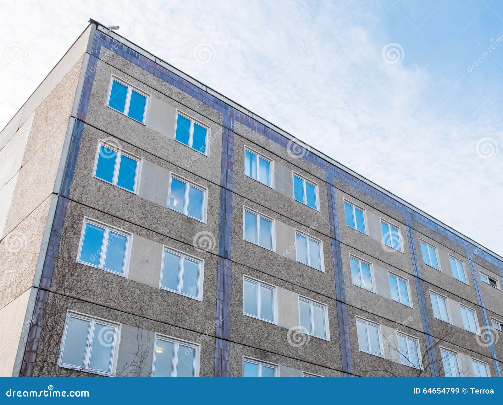 Reflection of Blue Sky in Windows of Gray Building Stock Image - Image ...