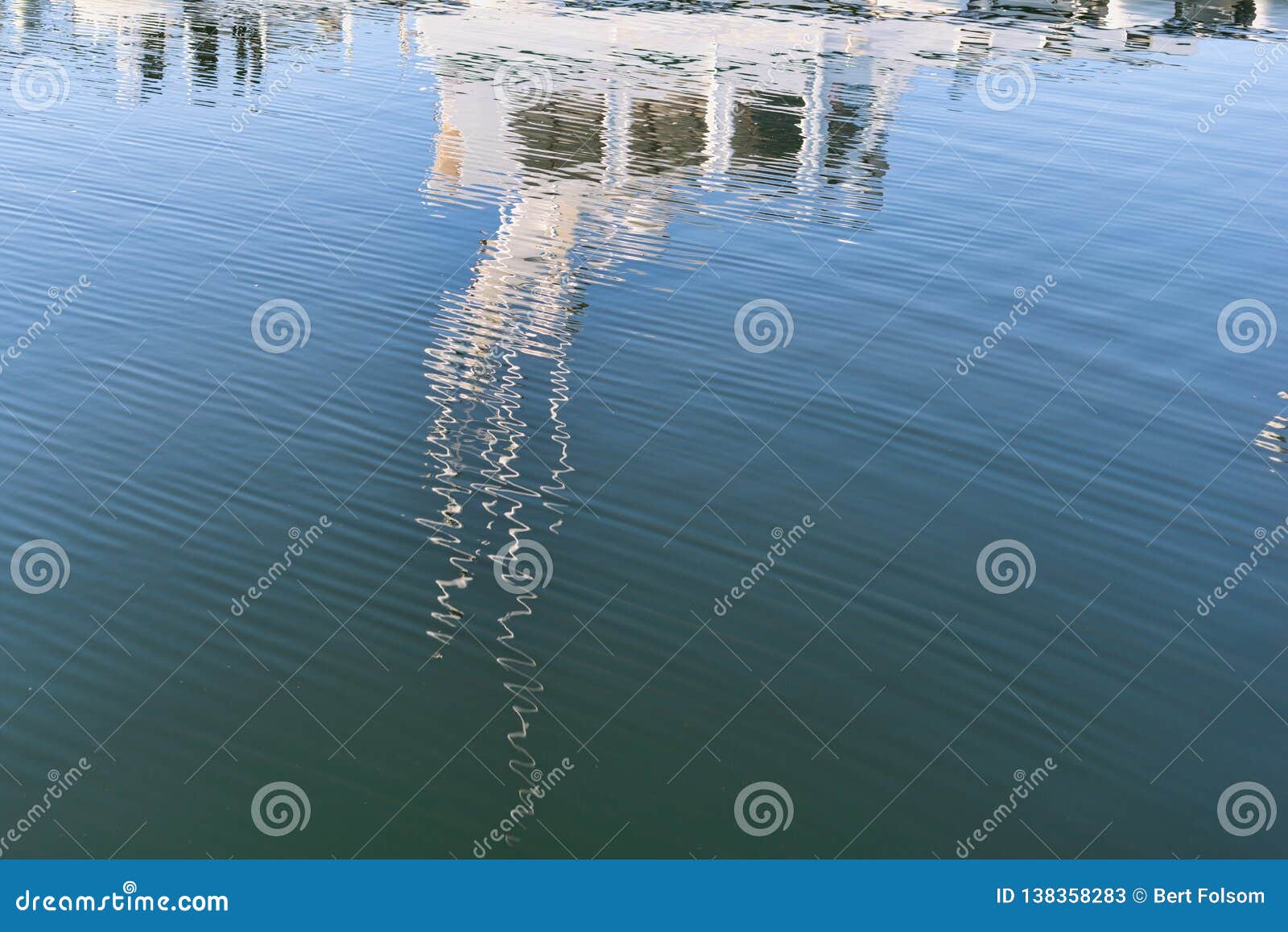 Reflection of a Boat on Rippling Water Stock Image - Image of ...