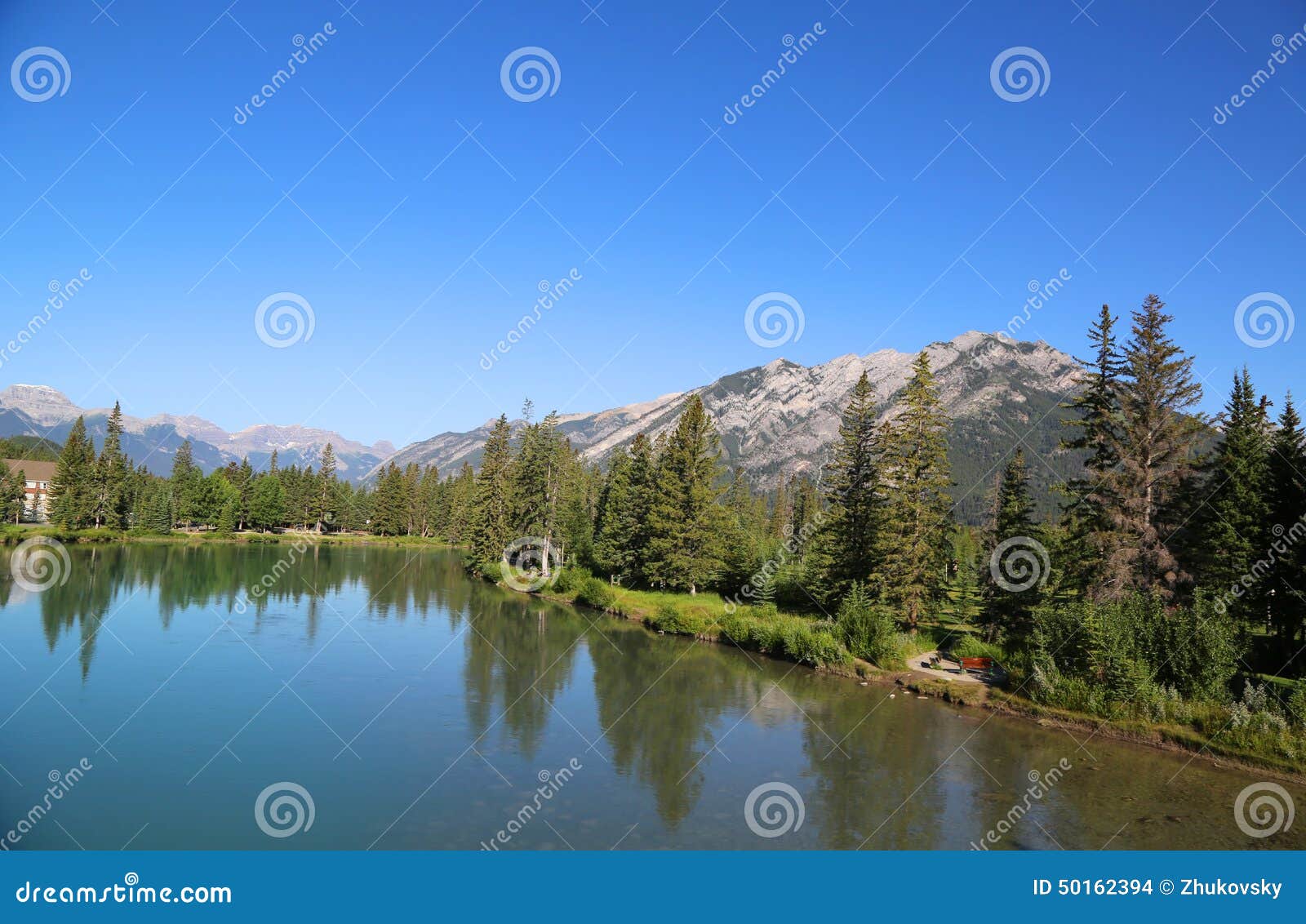Reflection in Bow River Near City of Banff in Alberta, Canada Stock ...