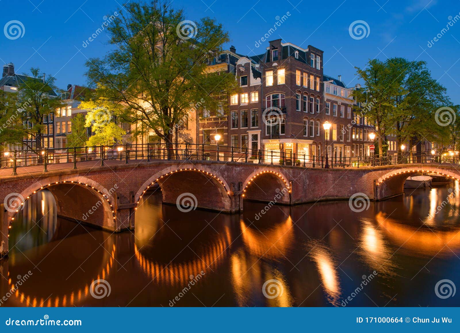 Reflection of Bridge at Night in Amsterdam, Netherlands Stock Photo ...
