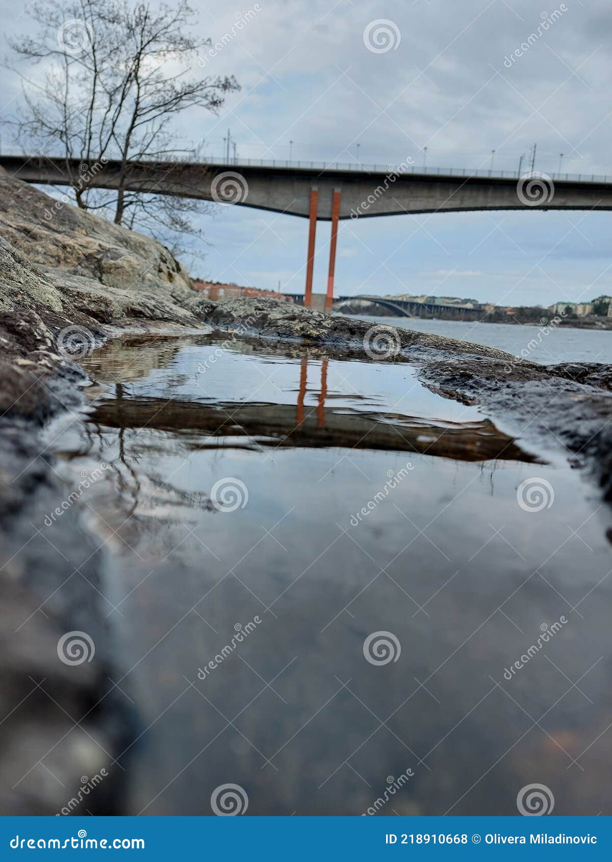 Bridge Reflection in the Water Stock Photo - Image of reflection ...
