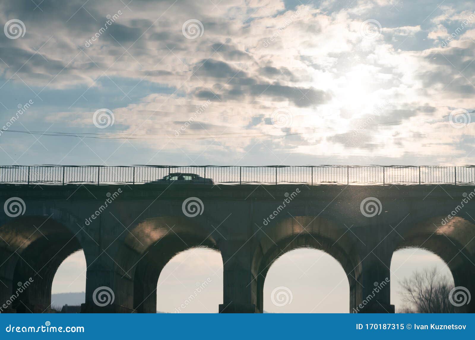Reflection of the Bridge on the Water Surface of the River Stock Image ...