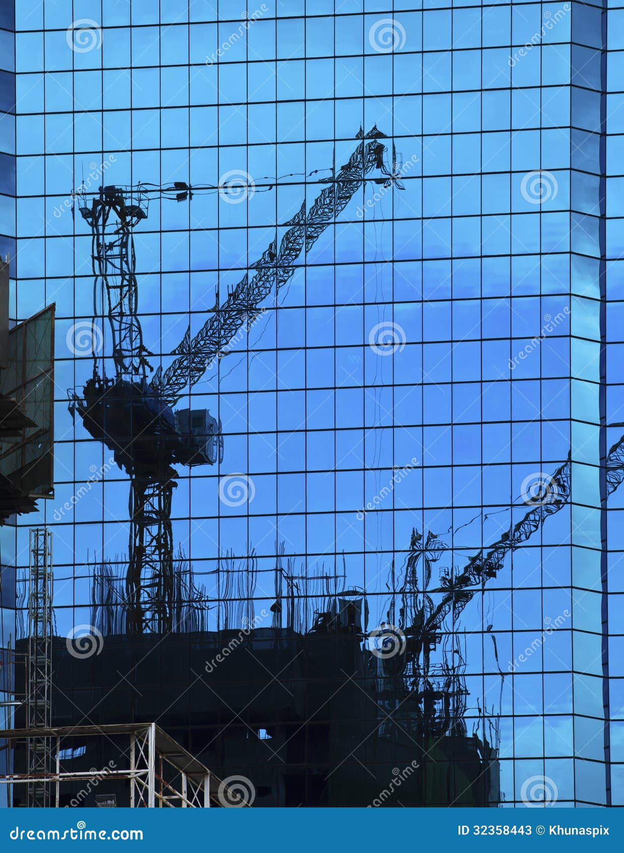 Reflection of Building Construction on Building Mirror Stock Image ...