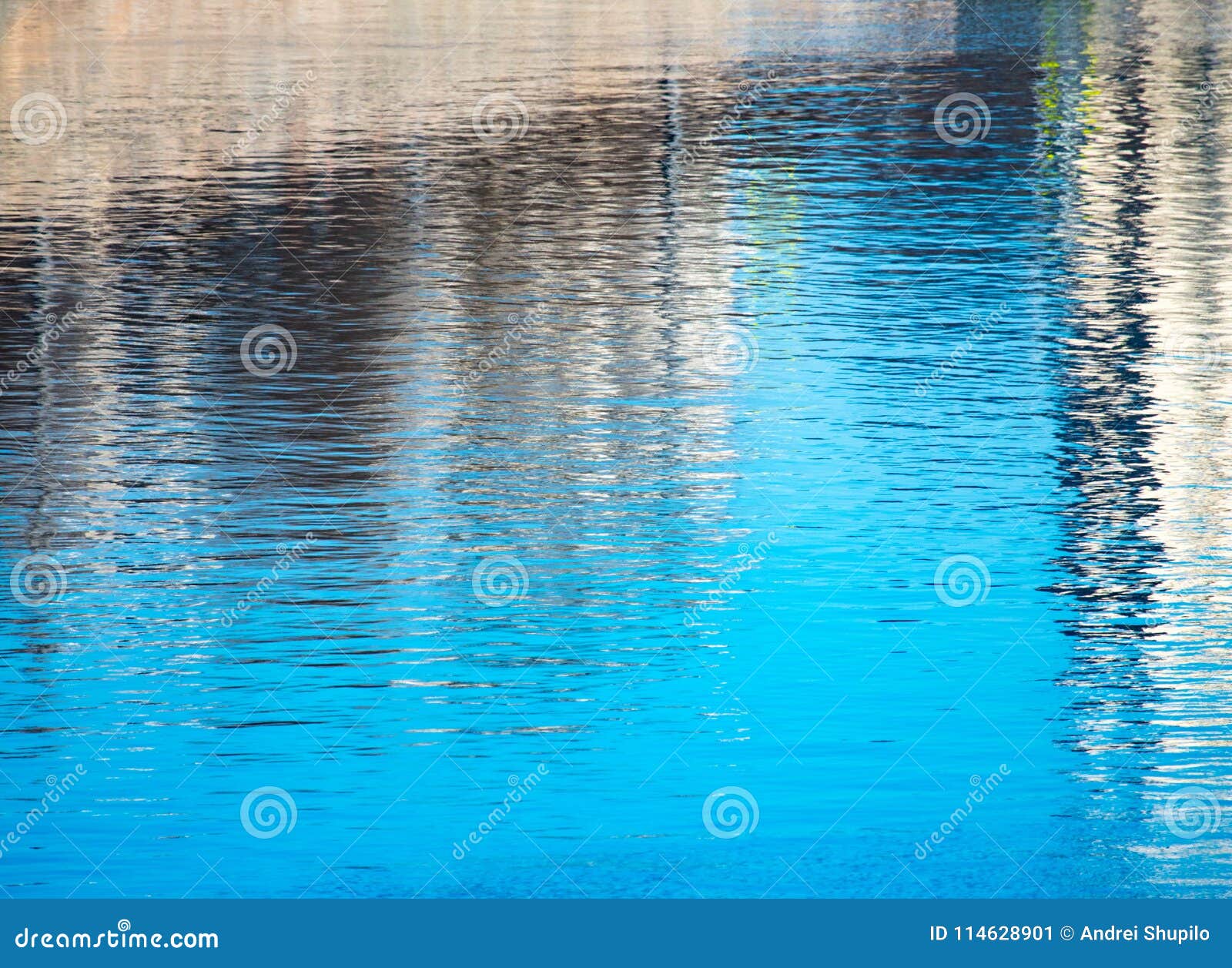 Reflection of a Building on the Smooth Surface of Water As a Background ...