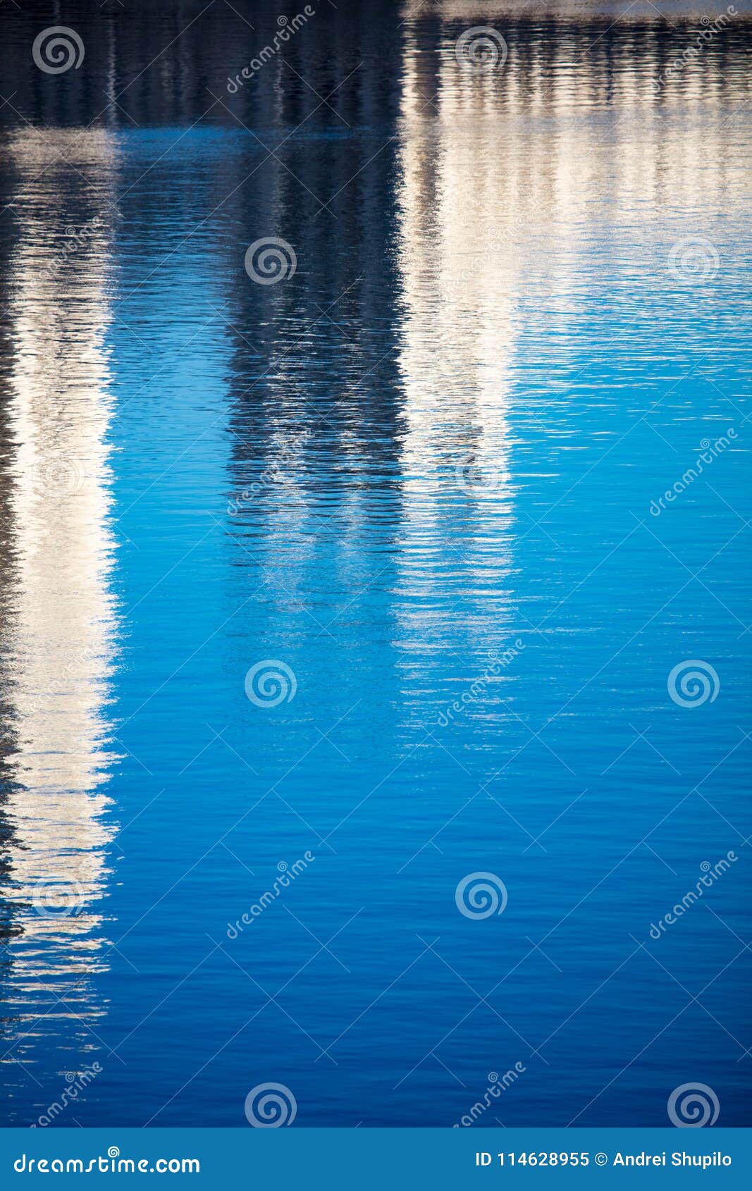 Reflection of a Building on the Smooth Surface of Water As a Background ...