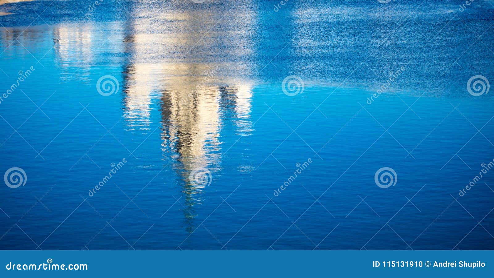 Reflection of a Building on the Smooth Surface of Water As a Background ...