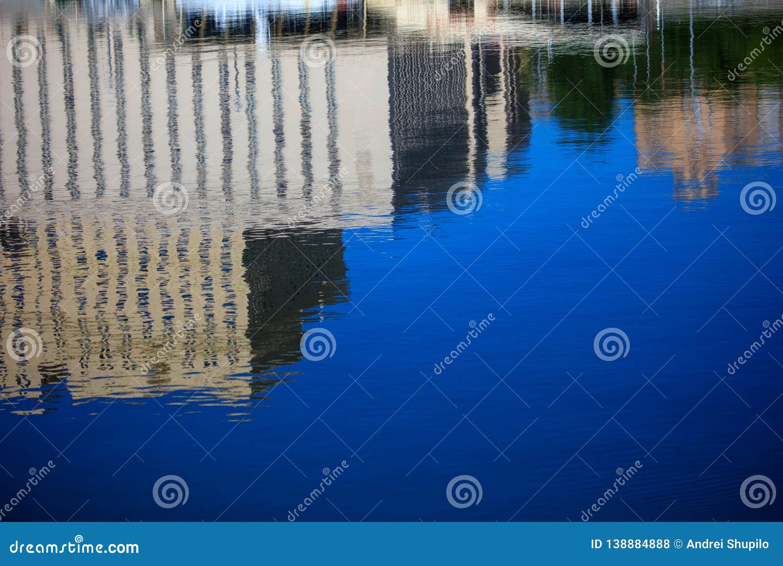 Reflection of a Building on the Surface of Water Stock Photo - Image of ...