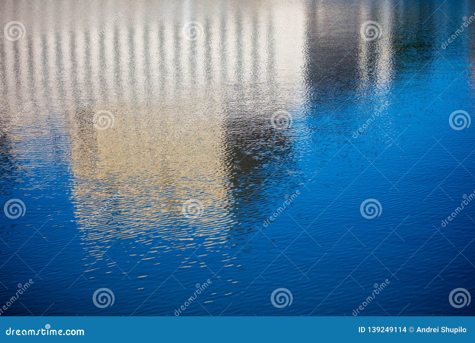 Reflection of a Building on the Surface of Water Stock Photo - Image of ...