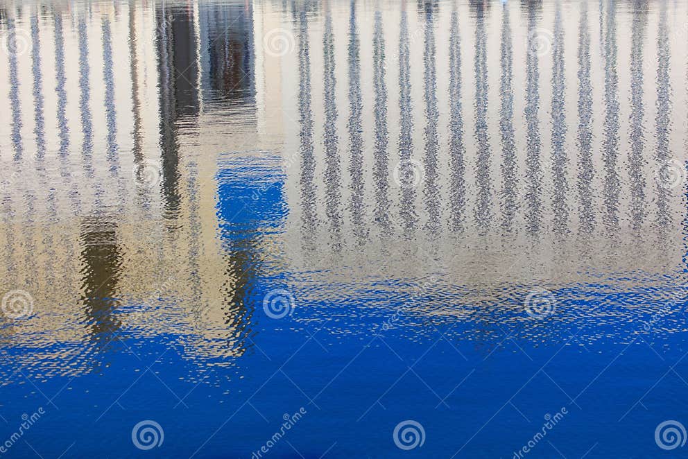 Reflection of a Building on the Surface of Water Stock Image - Image of ...