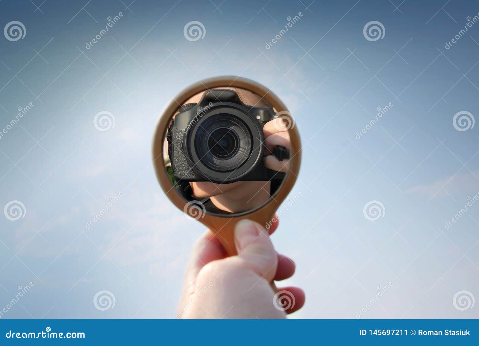 The Reflection of the Camera in the Mirror on the Background of a ...