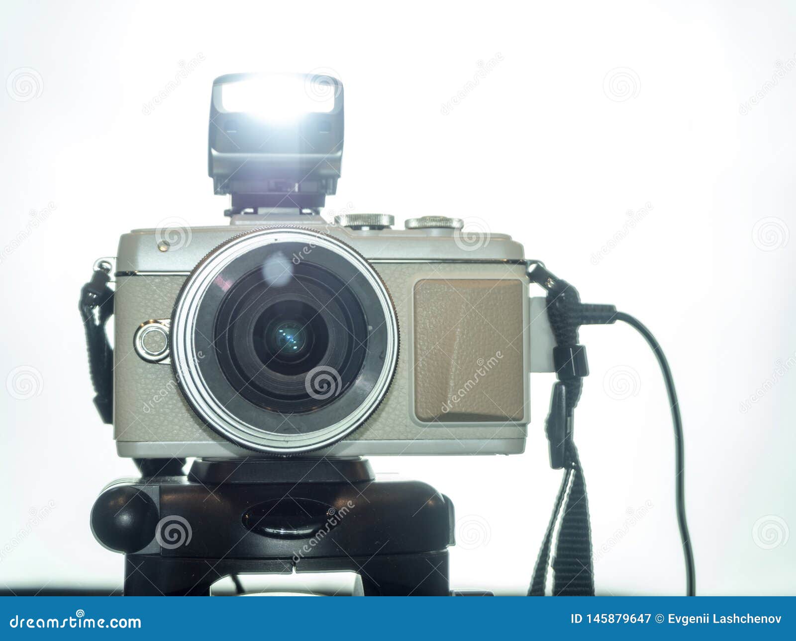 Reflection of the Camera in the Mirror with Flash on a White Background ...