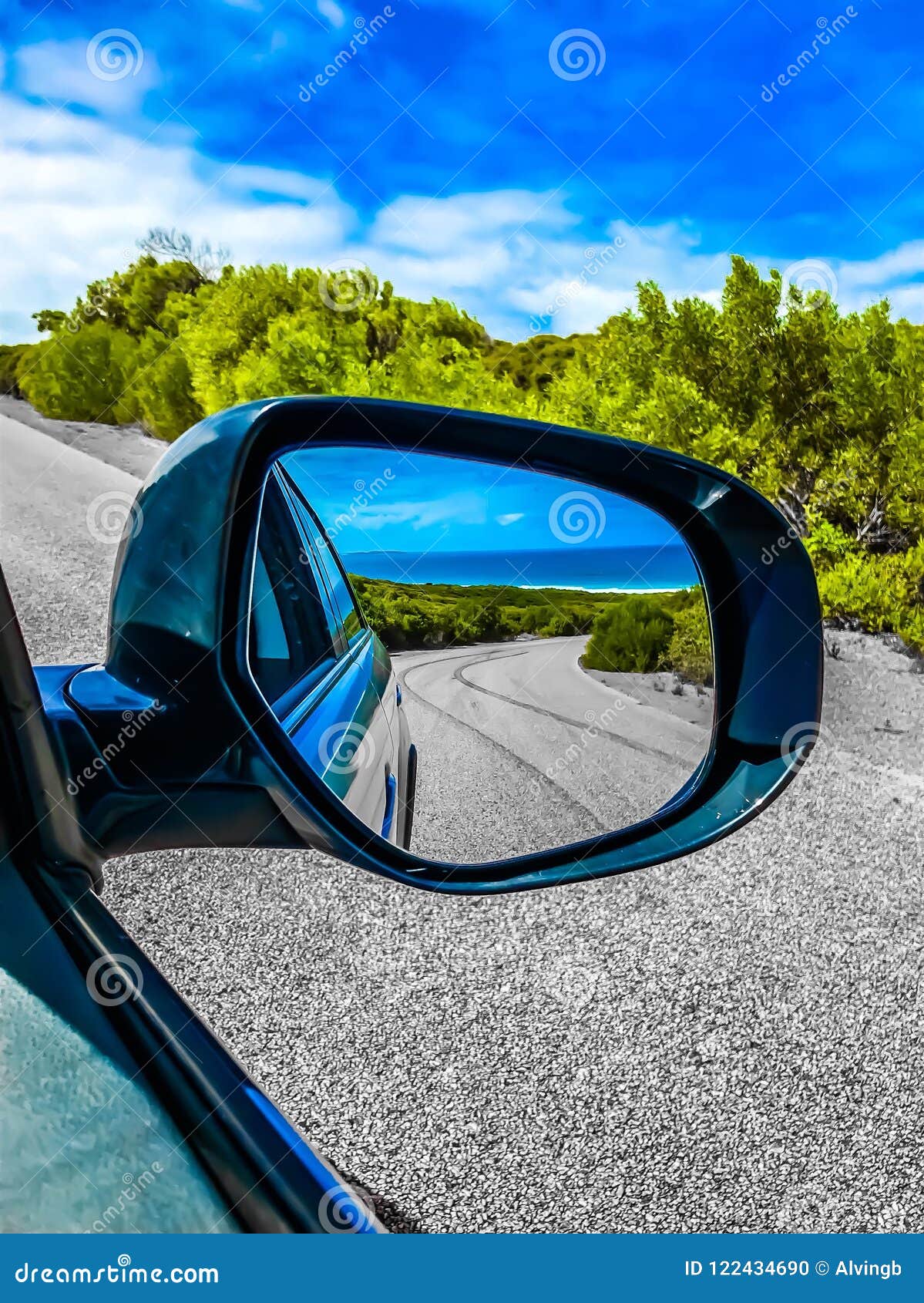 Reflection on a Car Mirror while Driving Stock Photo - Image of road ...