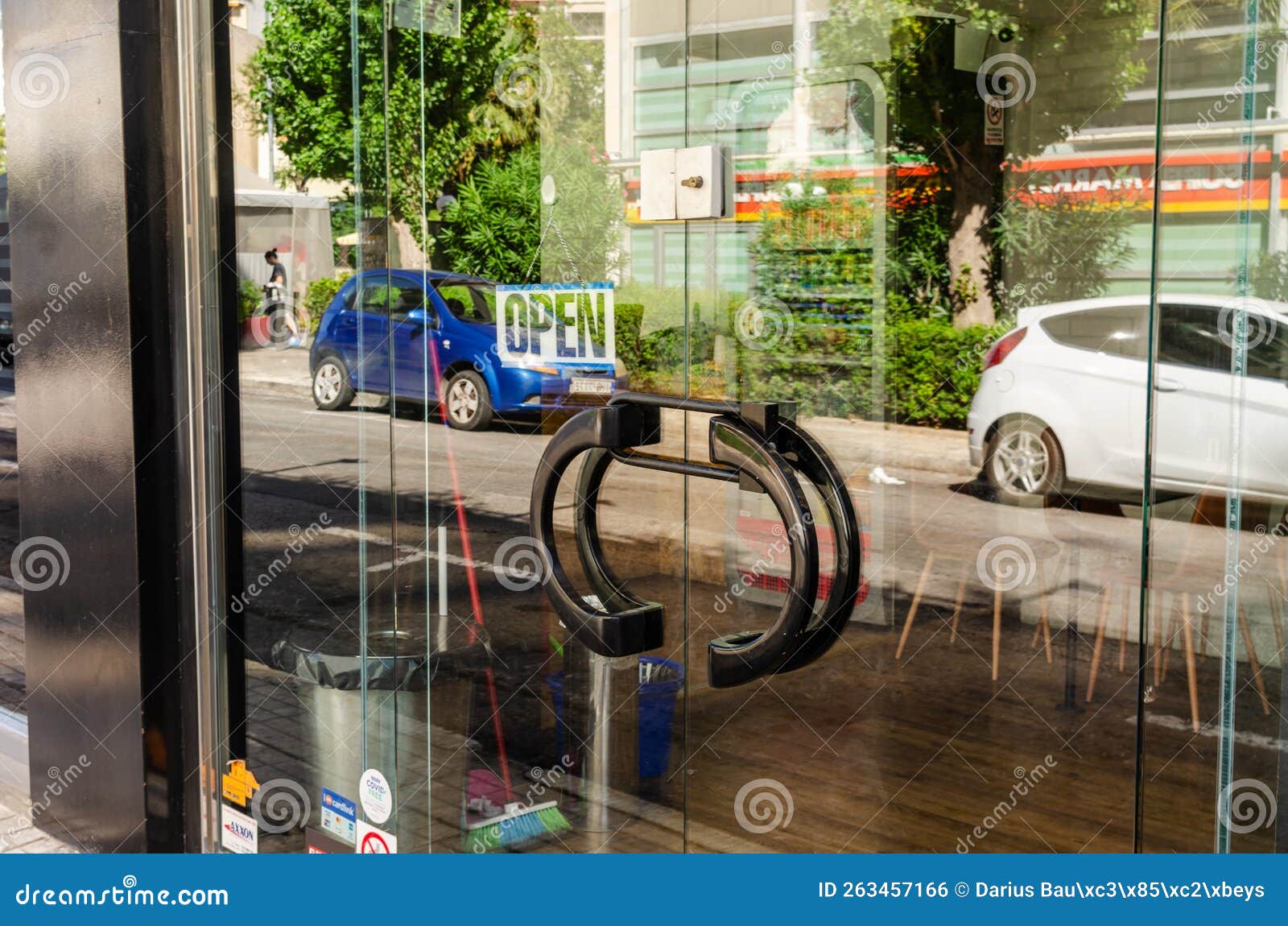 The Reflection of the City of Athens in the Locked Double Glass Doors ...