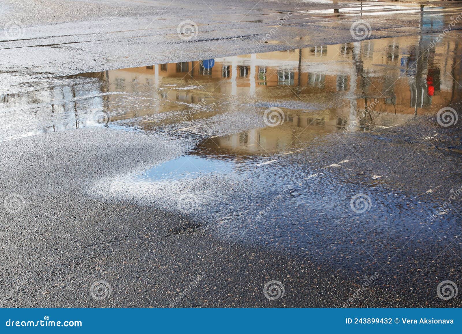 Reflection of City in Puddle on Pavement Stock Photo - Image of blue ...
