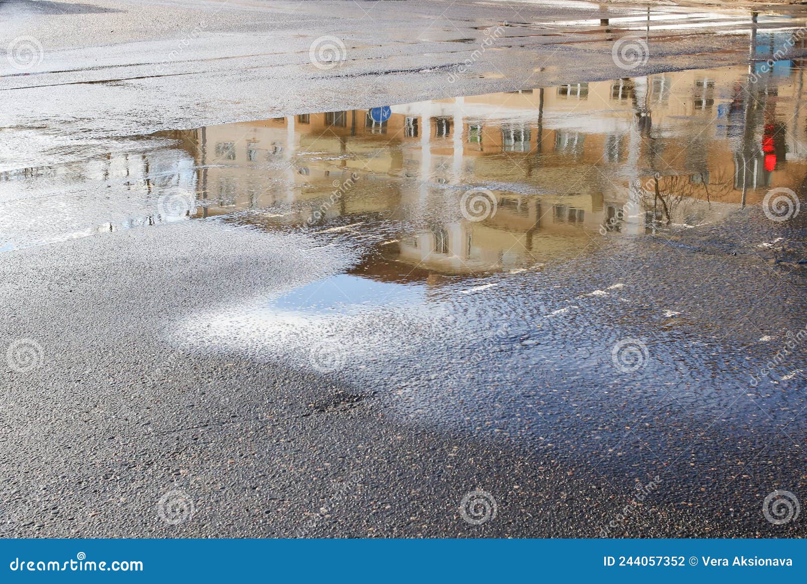 Reflection of City in Puddle on Pavement Stock Photo - Image of scene ...
