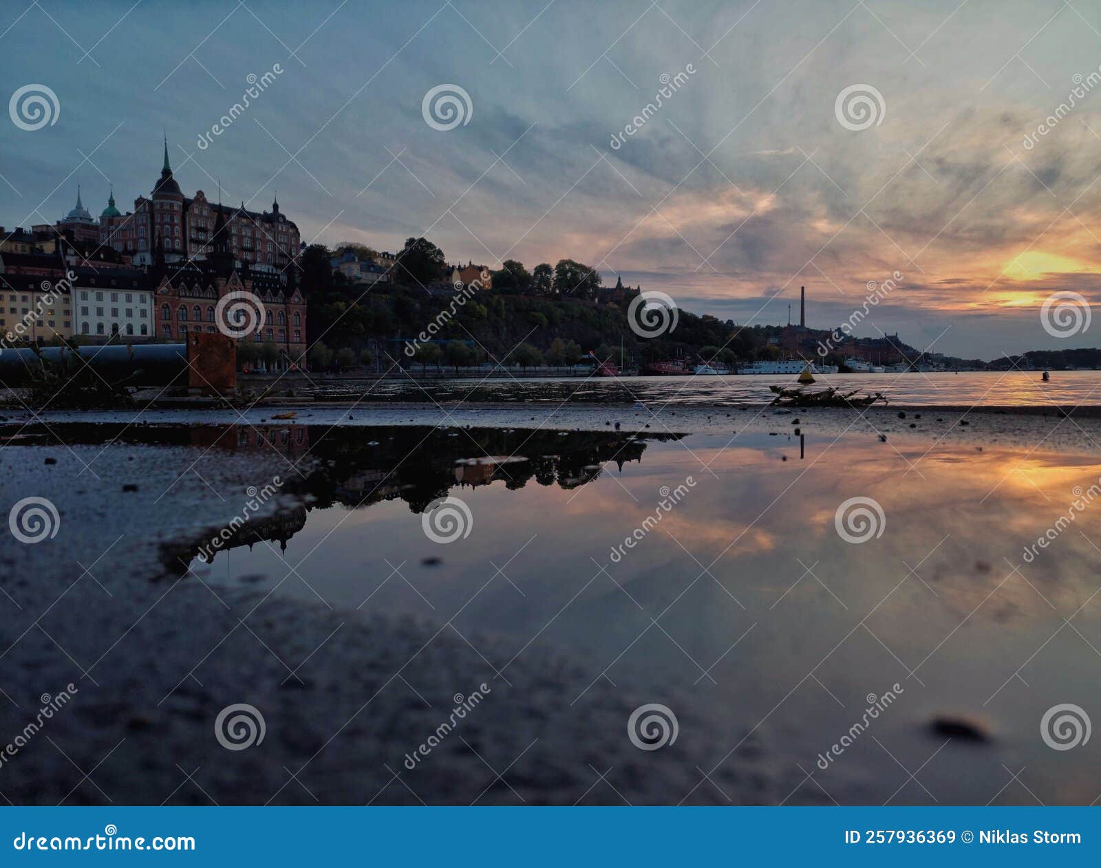 Reflection of Cityscape in a Puddle Stock Image - Image of morning ...