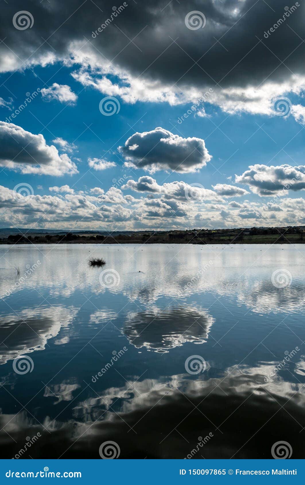 Reflection of Clouds on the Water Stock Image - Image of tranquil ...
