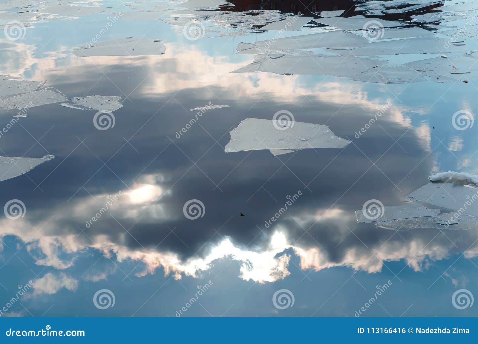 Spring, Reflection Clouds Water, Ice Floats, Sun and Clouds Reflected ...
