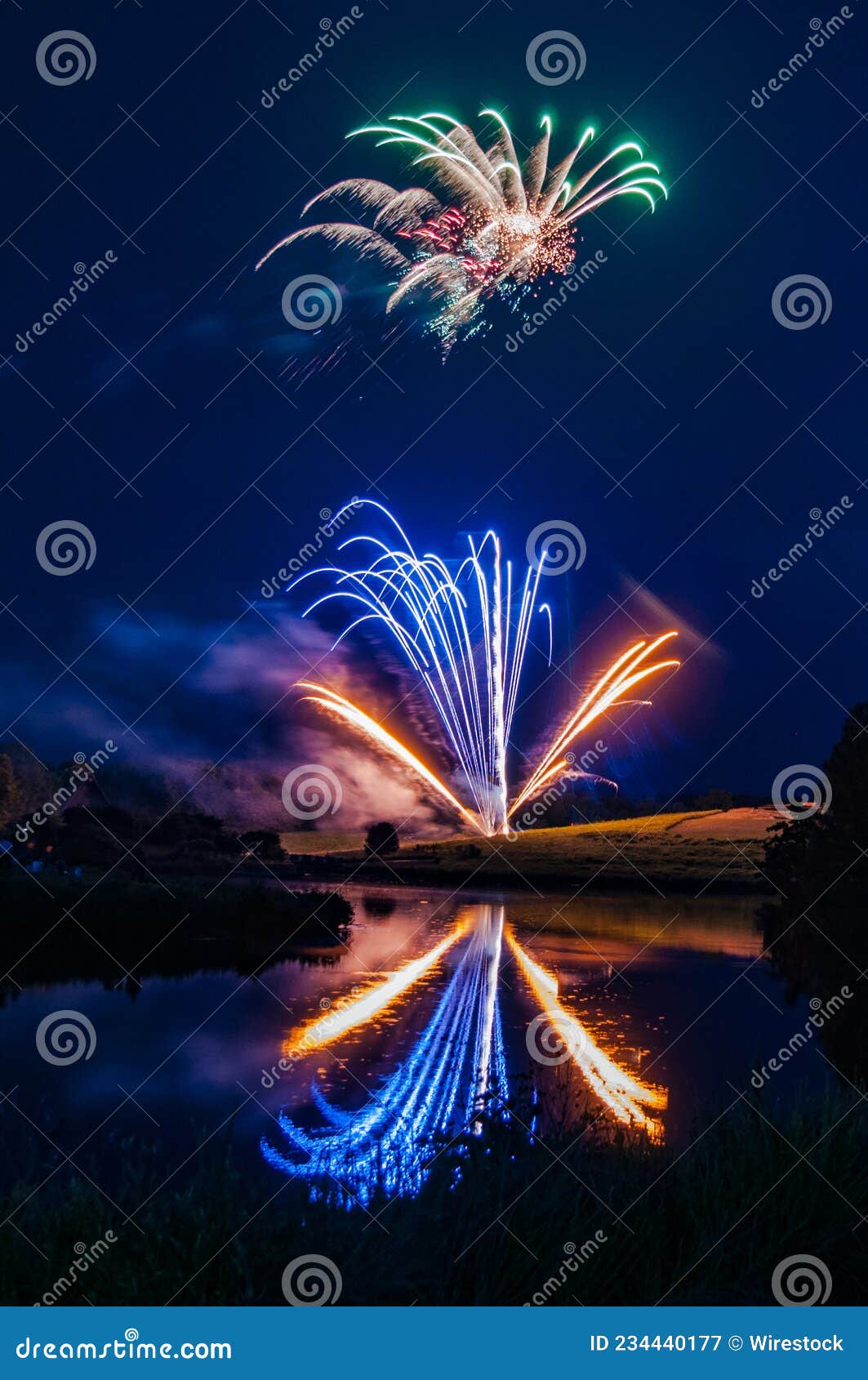 Reflection of Colorful Fireworks Exploded in the Dark Sky Stock Image ...